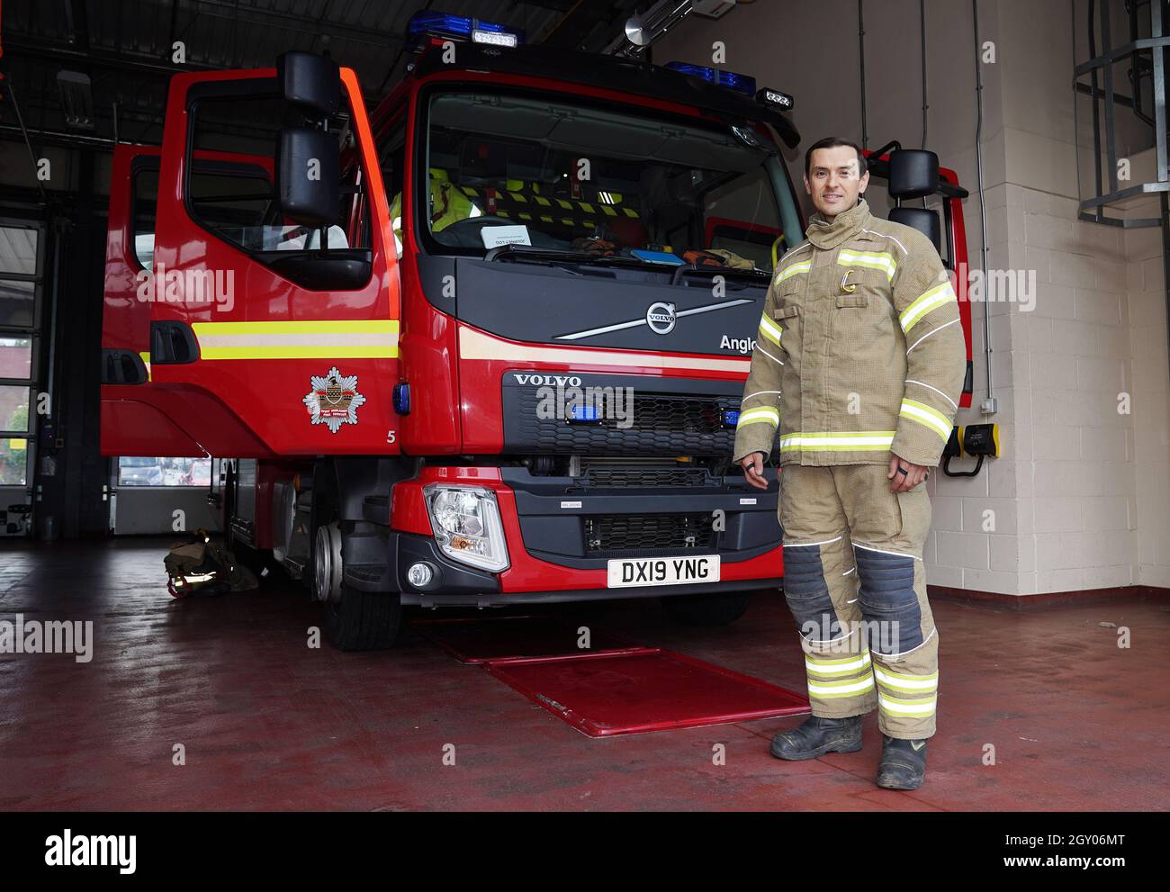 Former football player now fire fighter, Alex Nicholls poses for a ...