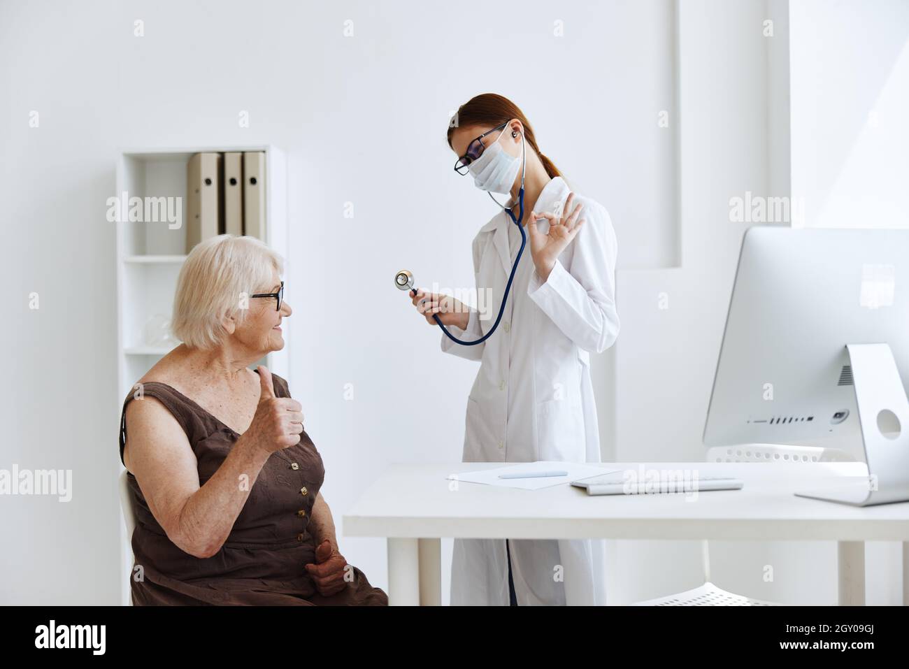 female doctor discussion with the patient health care Stock Photo - Alamy