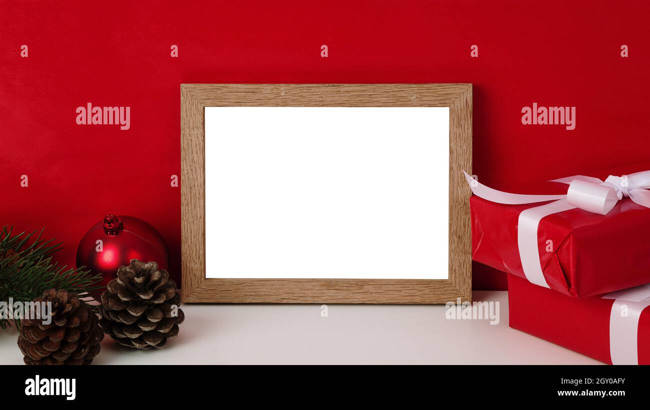Blank wooden photo frame mockup template and christmas decoration on ...