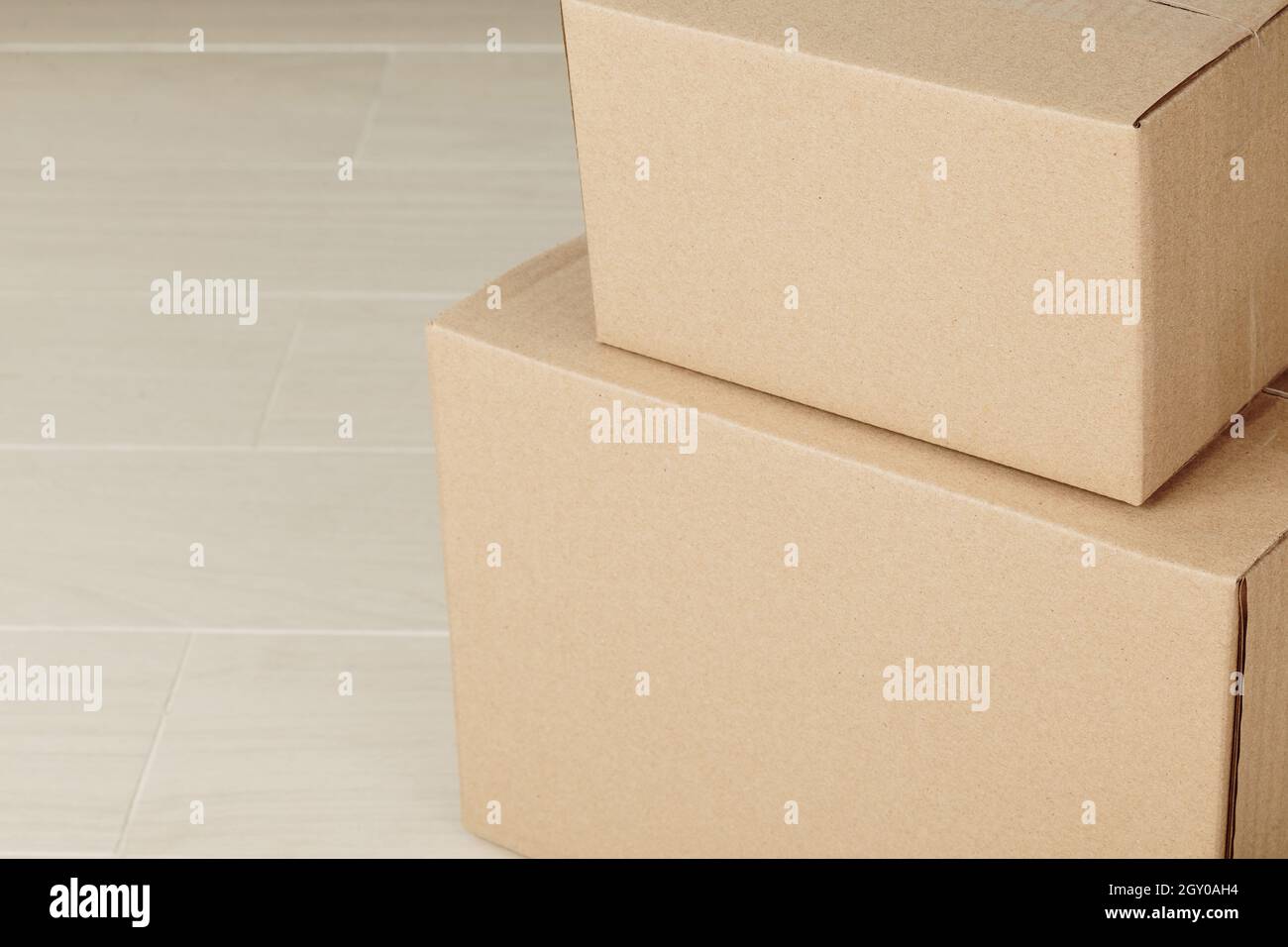 Stack of blank paper cardboard box mockup on the floor, Packaging ...