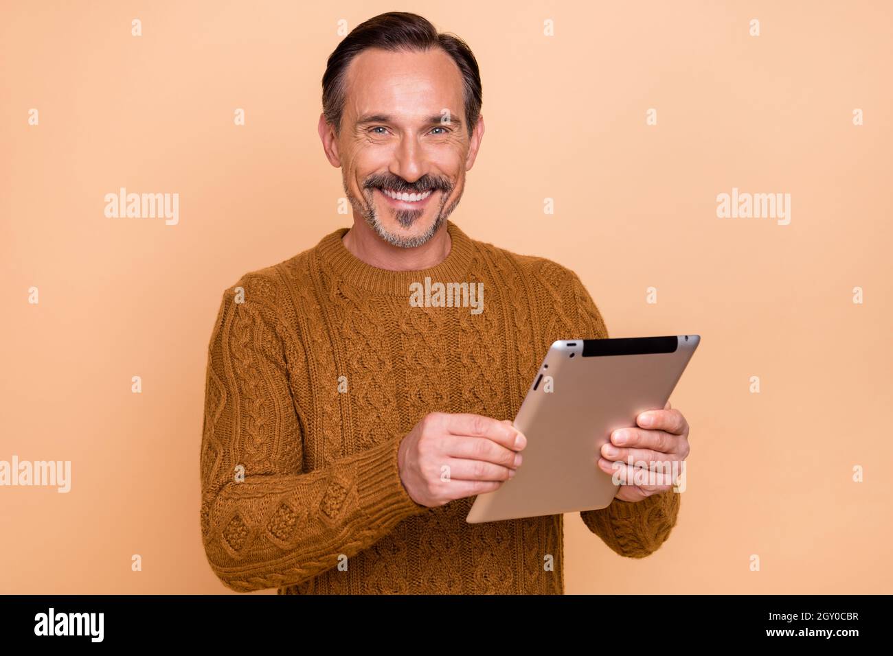 Photo of ceo brunet man write tablet wear knitwear sweater isolated on ...
