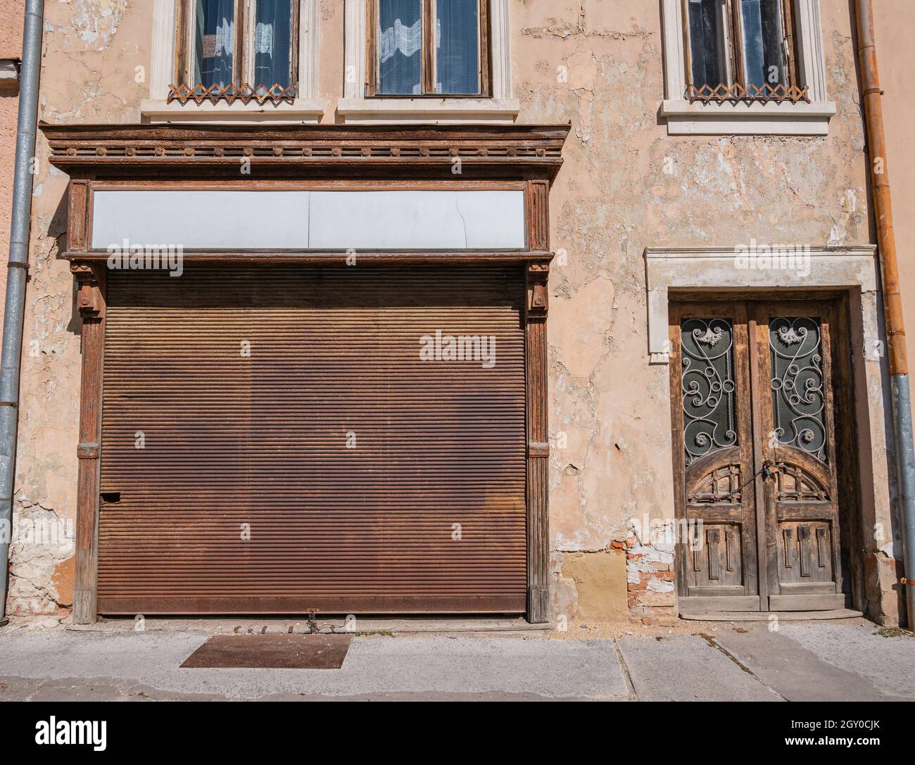 A closed shop window in an old house Stock Photo - Alamy