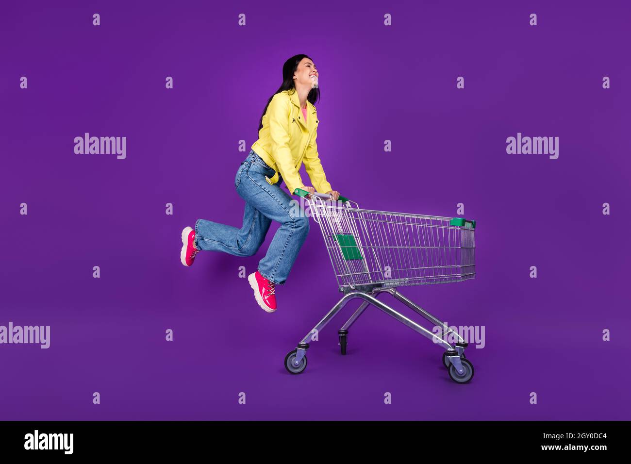 Full size profile side photo of young girl fly jumper make shopping ...