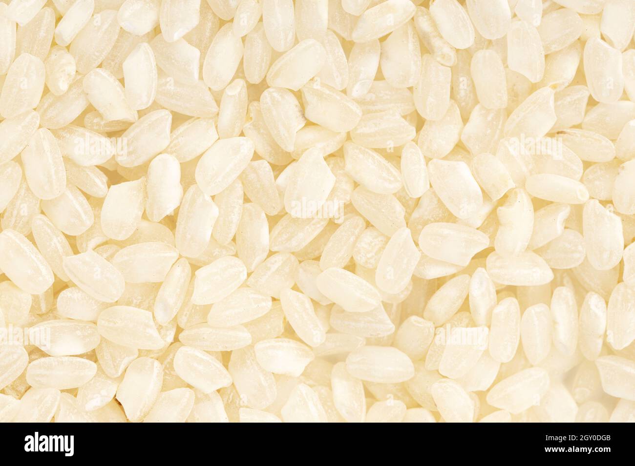 Uncooked rice background texture. Full frame Stock Photo - Alamy