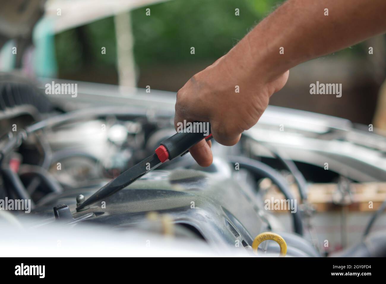 working and repair on car engine Stock Photo - Alamy