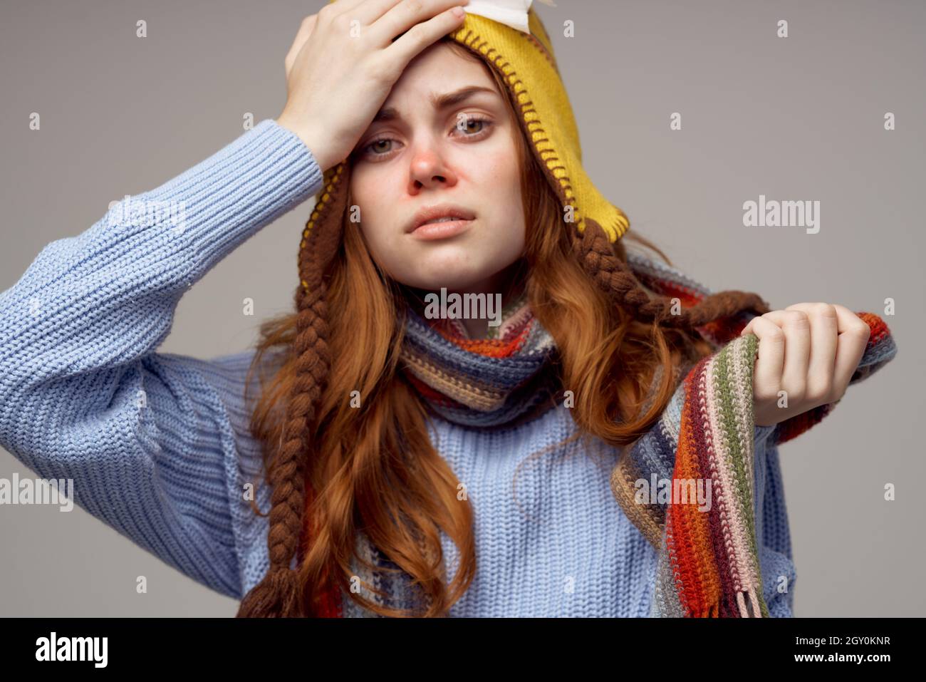 red-haired woman flu infection virus health care light background Stock ...