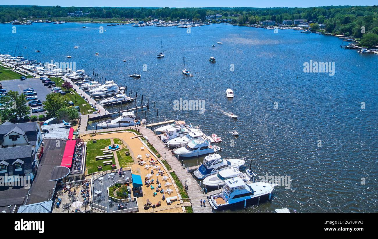 Aerial of lake town with docks filled with boats Stock Photo - Alamy