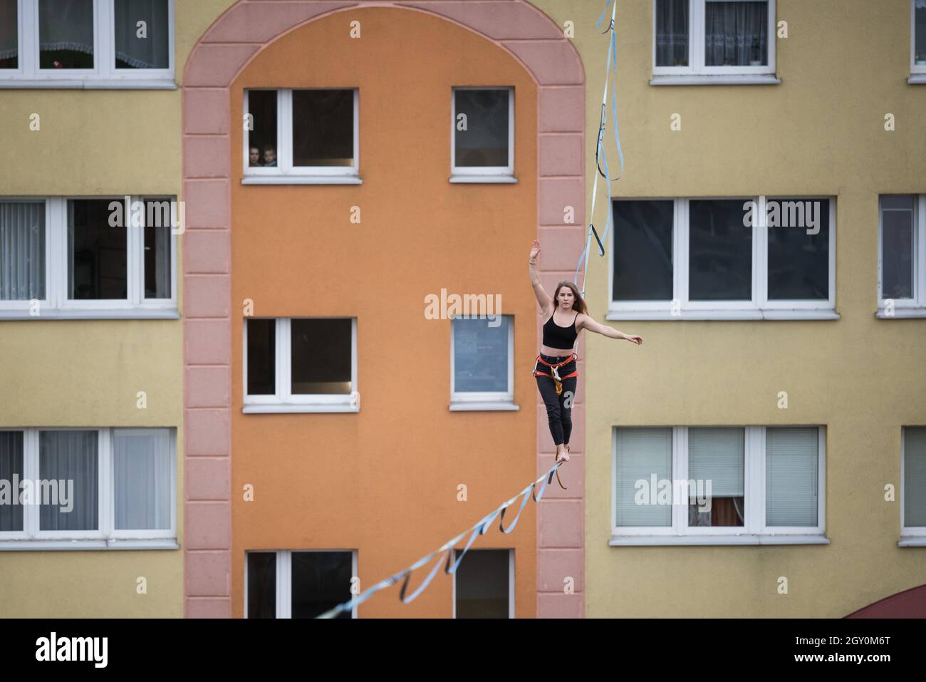 Girl climbing window hi-res stock photography and images - Alamy