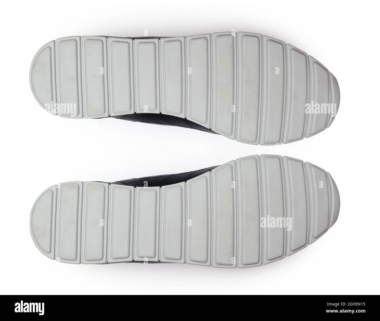 Bottom of shoes, isolated on white background Stock Photo - Alamy