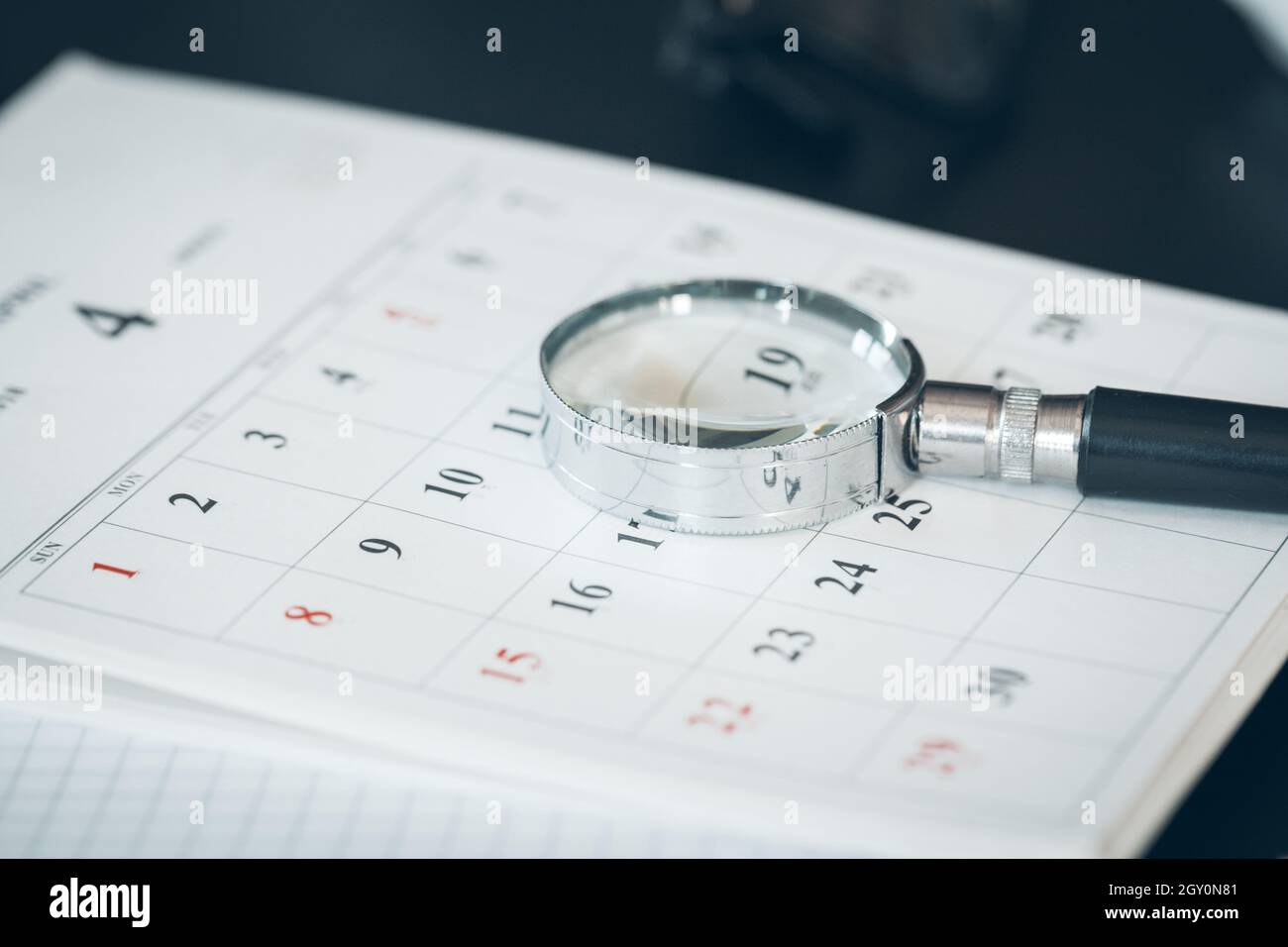 Calendar and Magnifying glass. Concept image of business meetings Stock ...