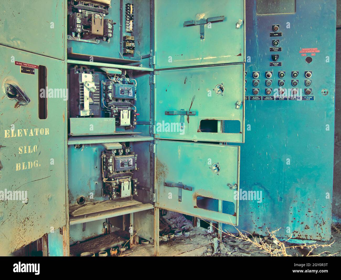 Old derelict manufacturing control panel Stock Photo - Alamy