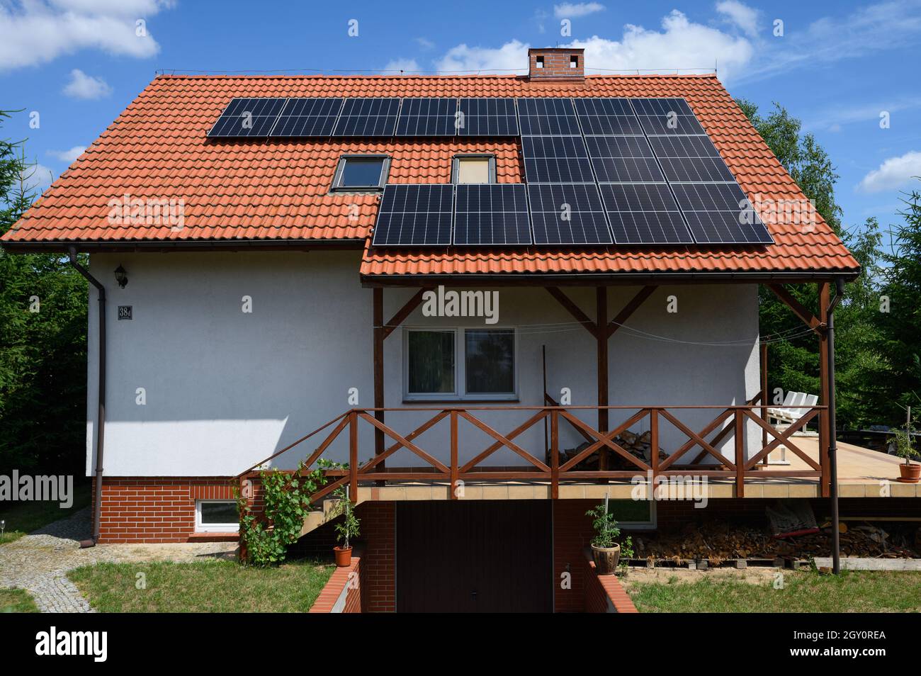 Single-family house with photovoltaic panels on the roof Stock Photo ...