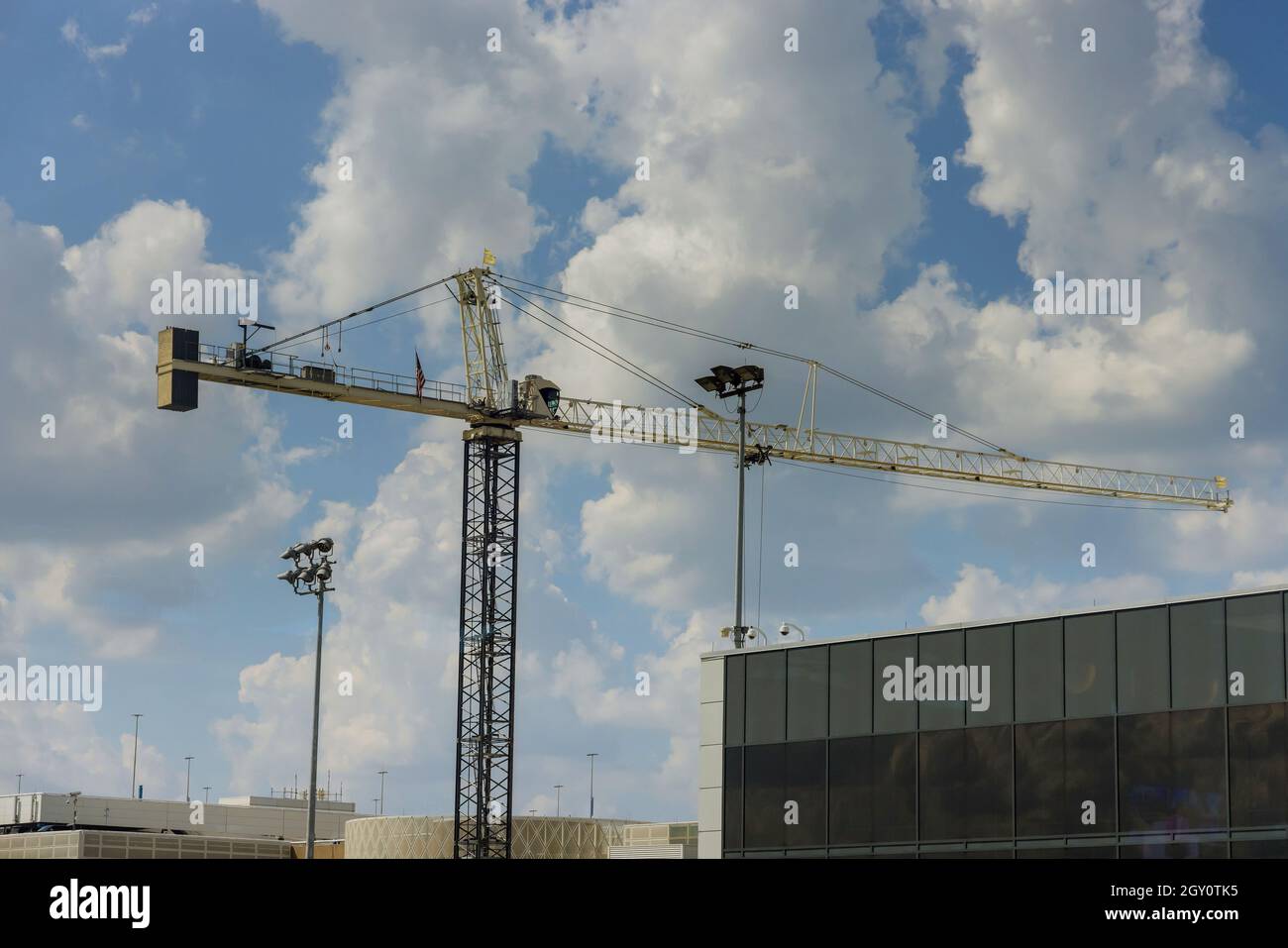 High rise building construction with tower crane Stock Photo - Alamy