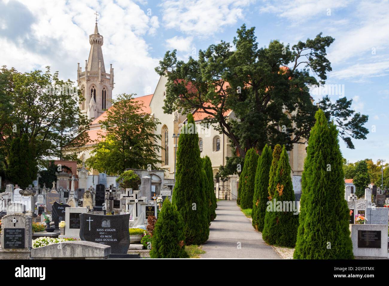 Szent Mihaly templom (St Saint Michael church) with the old cemetery ...