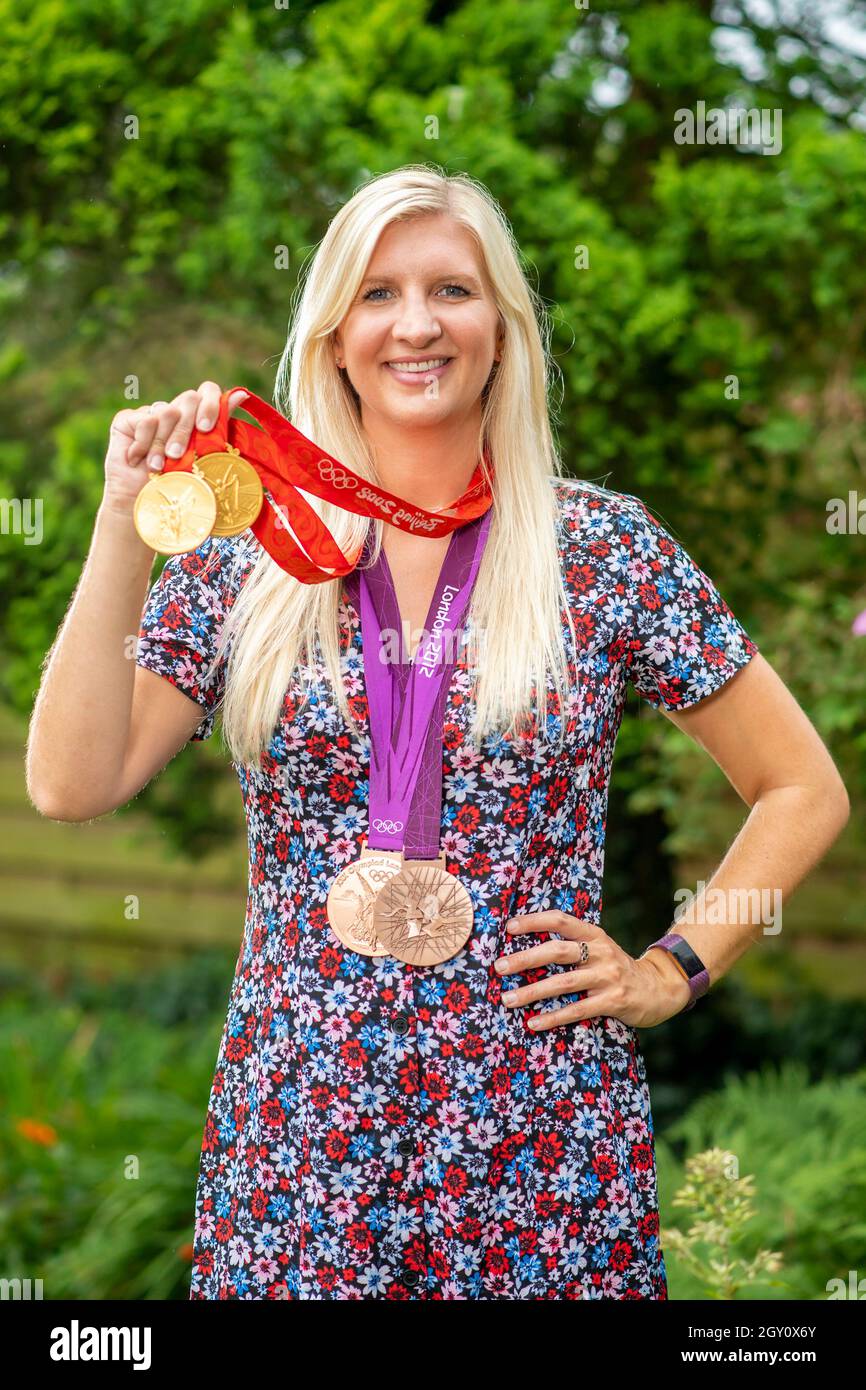 Becky Adlington poses with her Olympic medals at home in Marple ...