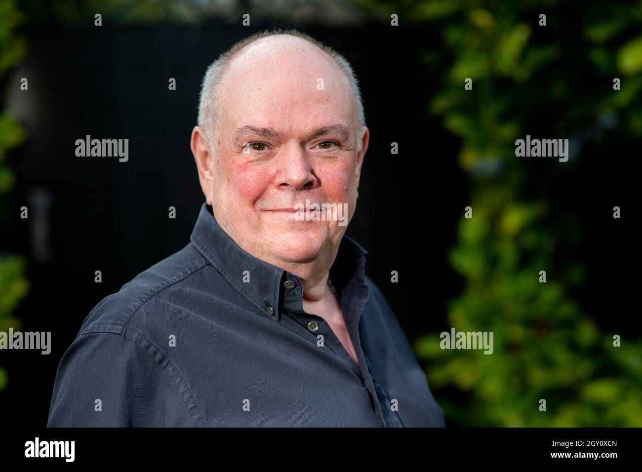 Sir Bernard Gray poses for a portrait at home in Bowden, UK Stock Photo ...