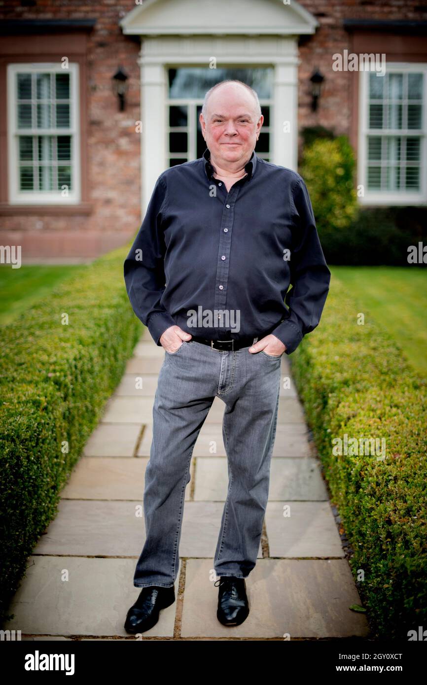 Sir Bernard Gray poses for a portrait at home in Bowden, UK Stock Photo ...