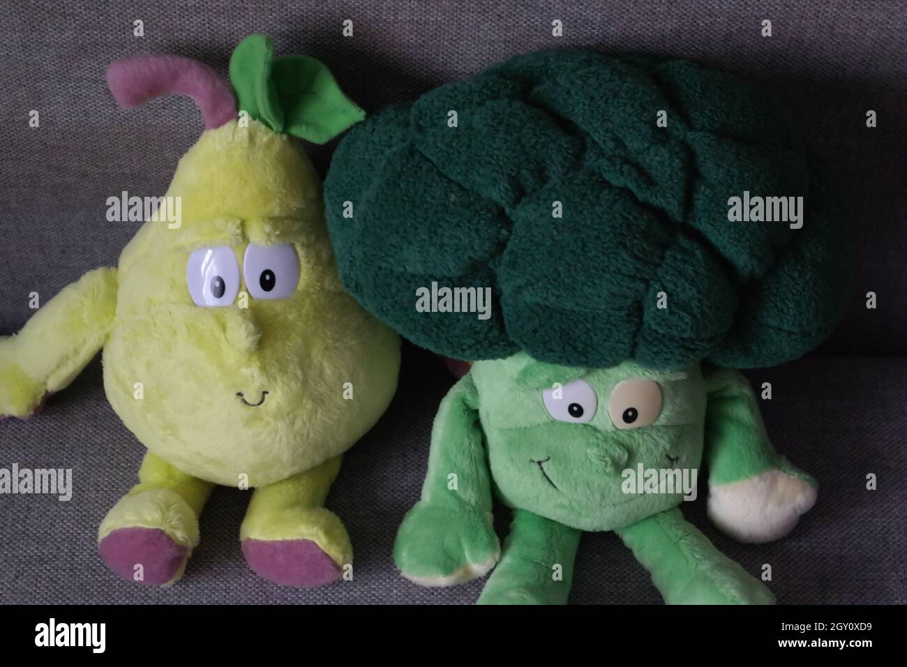 Adorable pear and broccoli plush toys Stock Photo - Alamy