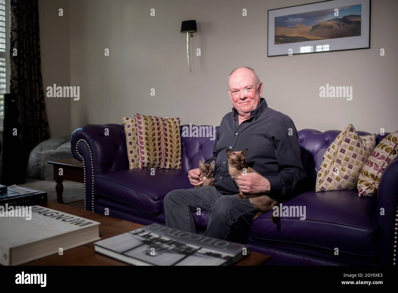 Sir Bernard Gray poses for a portrait at home in Bowden, UK Stock Photo ...