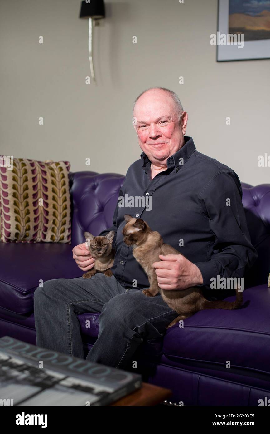 Sir Bernard Gray poses for a portrait at home in Bowden, UK Stock Photo ...