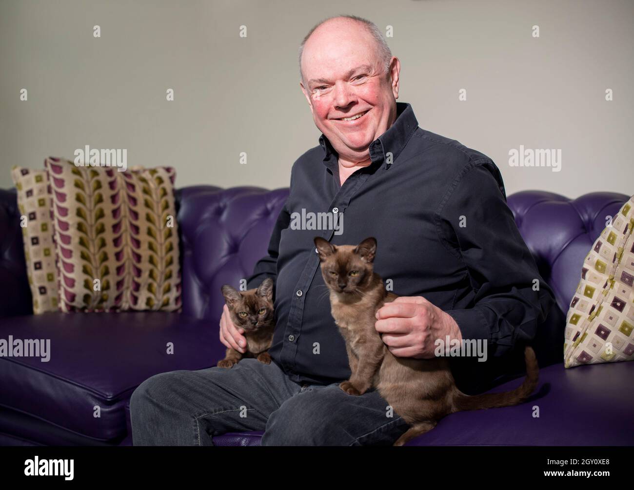 Sir Bernard Gray poses for a portrait at home in Bowden, UK Stock Photo ...