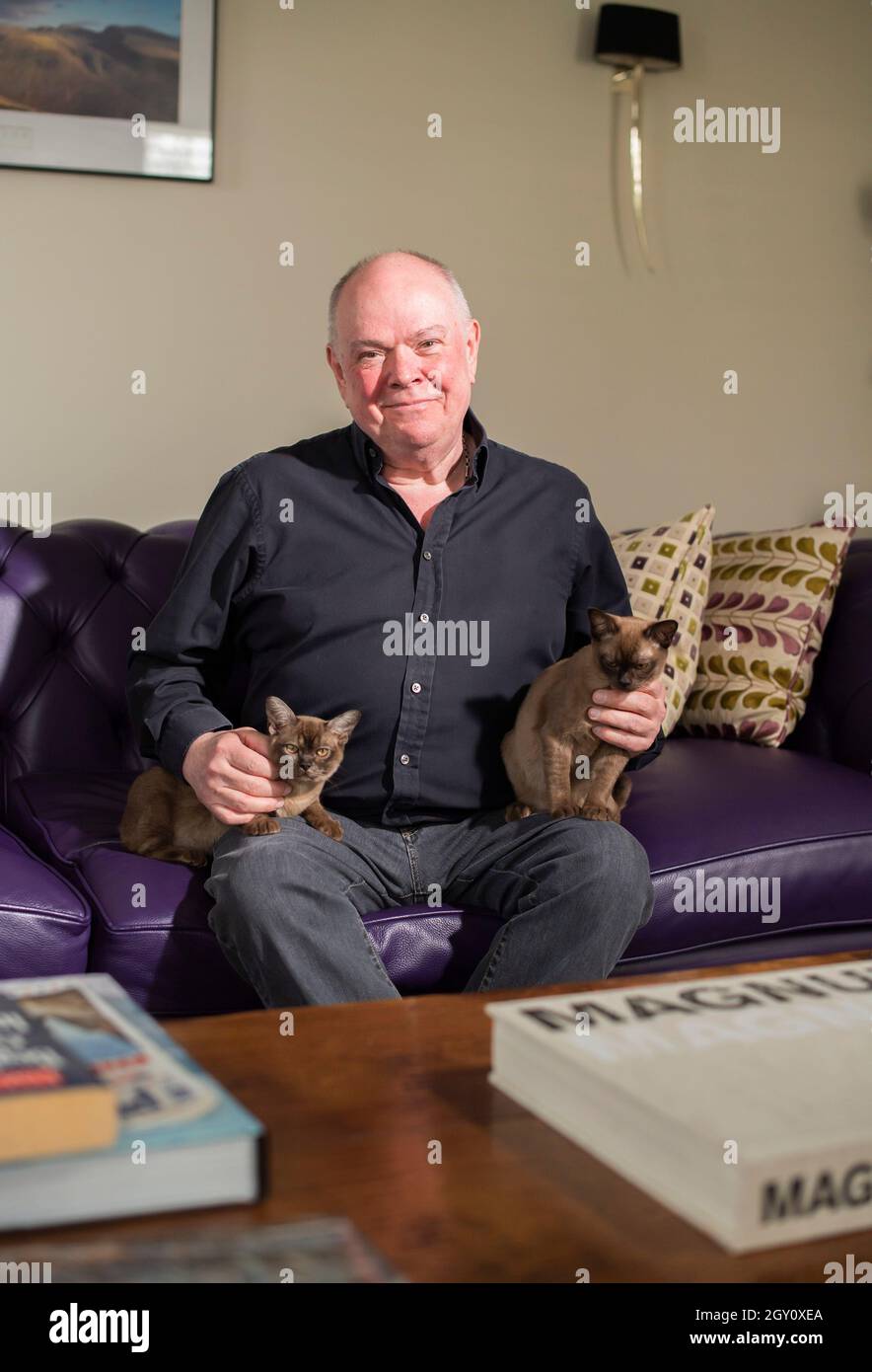Sir Bernard Gray poses for a portrait at home in Bowden, UK Stock Photo ...