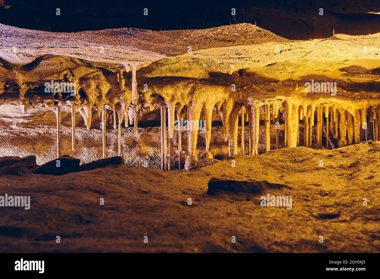 Detail of narrow cave area and formations of stalactites Stock Photo ...
