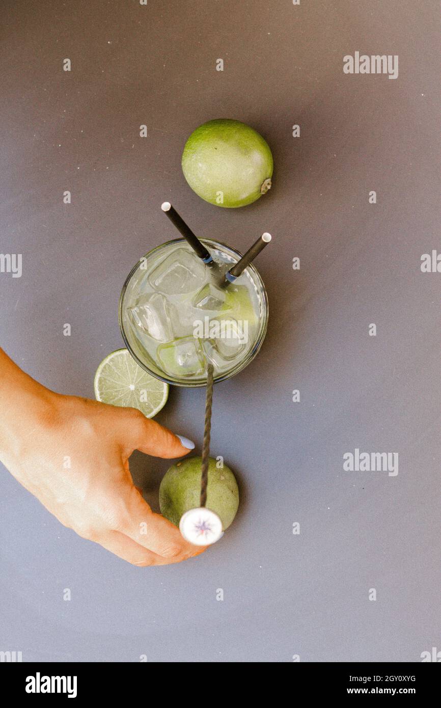 Lime Cocktail Preparation Stock Photo - Alamy