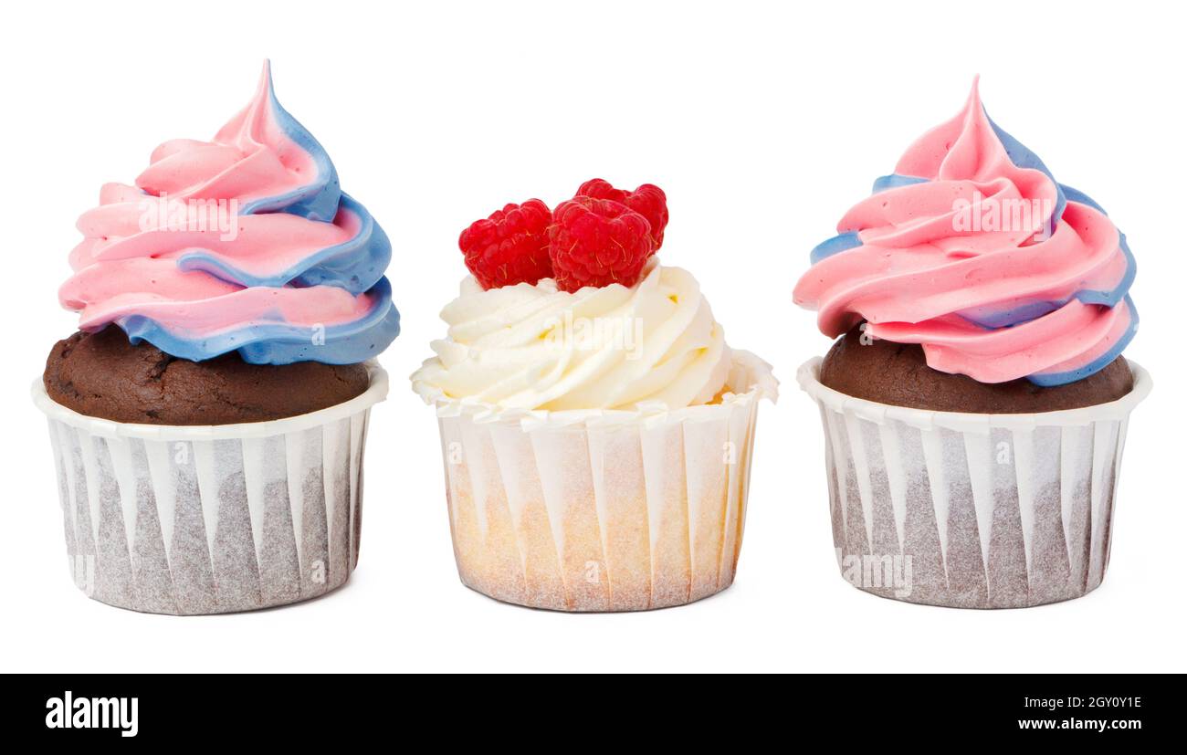 Three tasty cupcakes with cream topping isolated on white Stock Photo ...