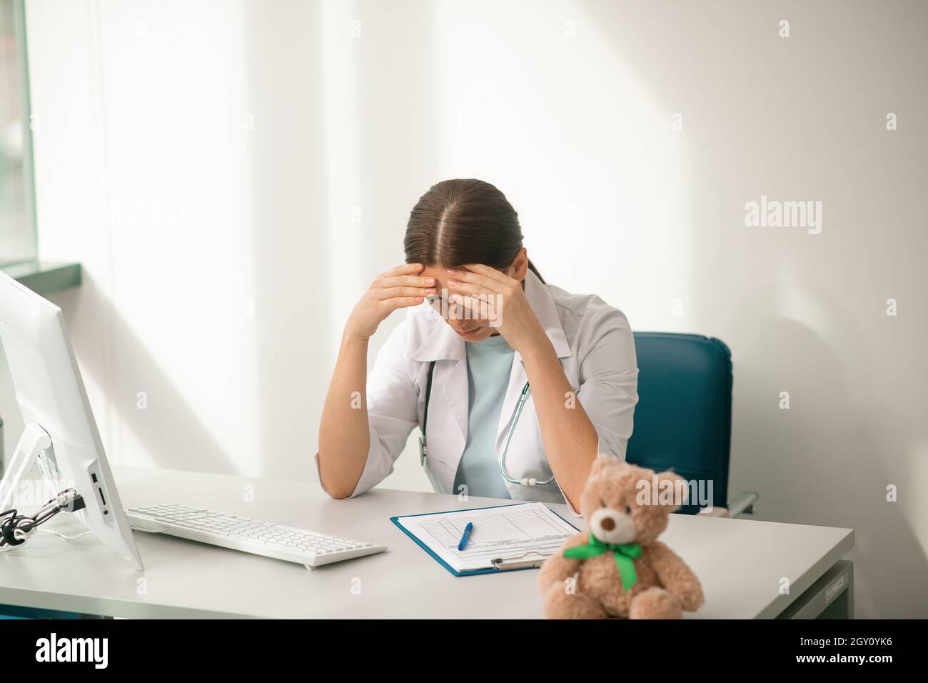 Feeling tired sitting table hi-res stock photography and images - Alamy