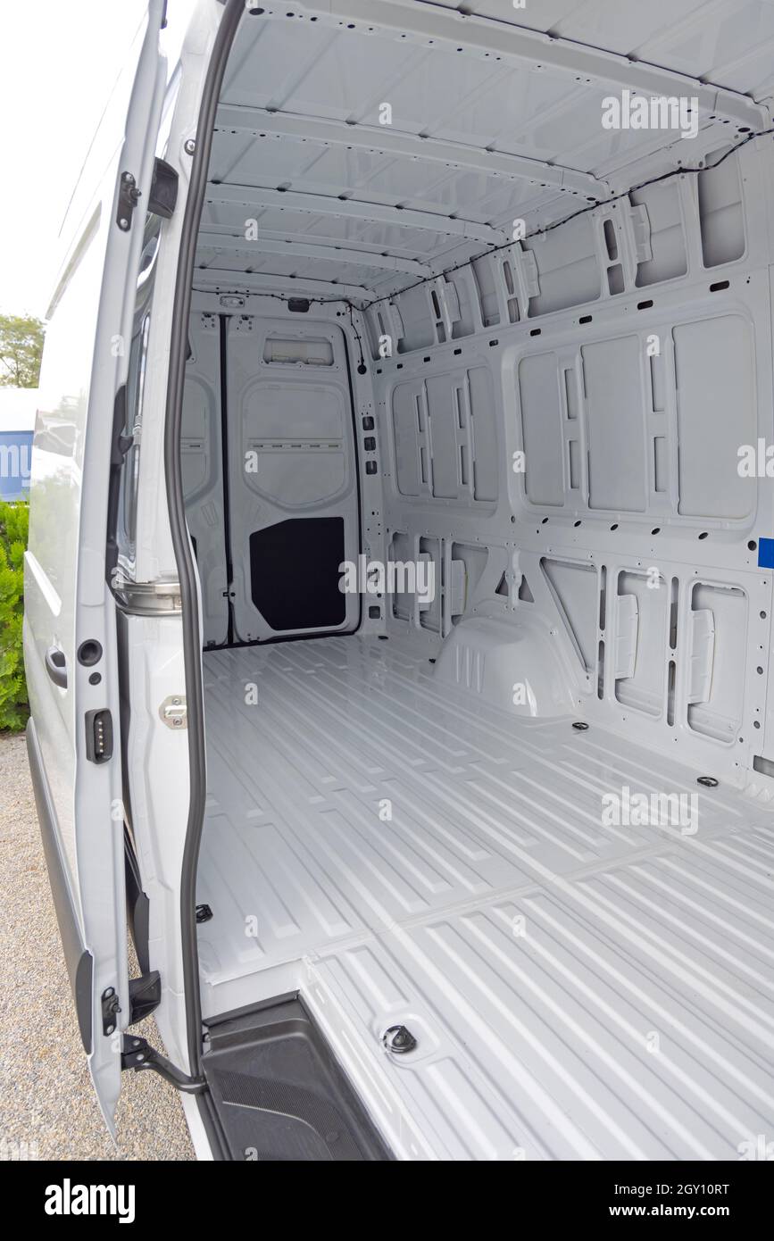 Open Side Door View in Empty White Cargo Transport Van Stock Photo - Alamy