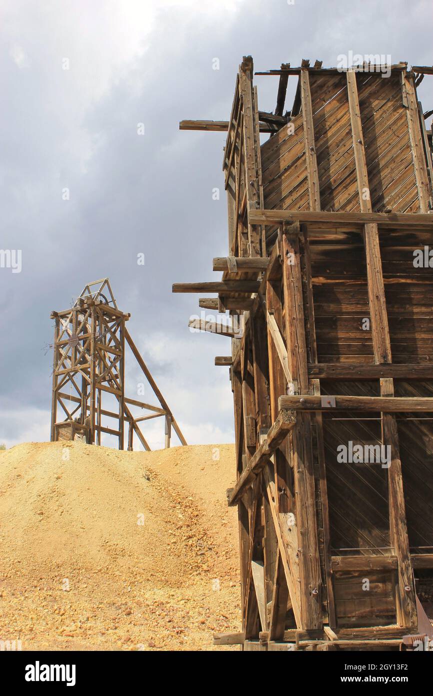 Mine ruins tower over the landscape Stock Photo - Alamy