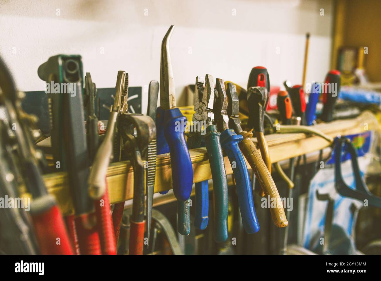 Tools in the workshop. A set of working tools on the shelf. Special ...