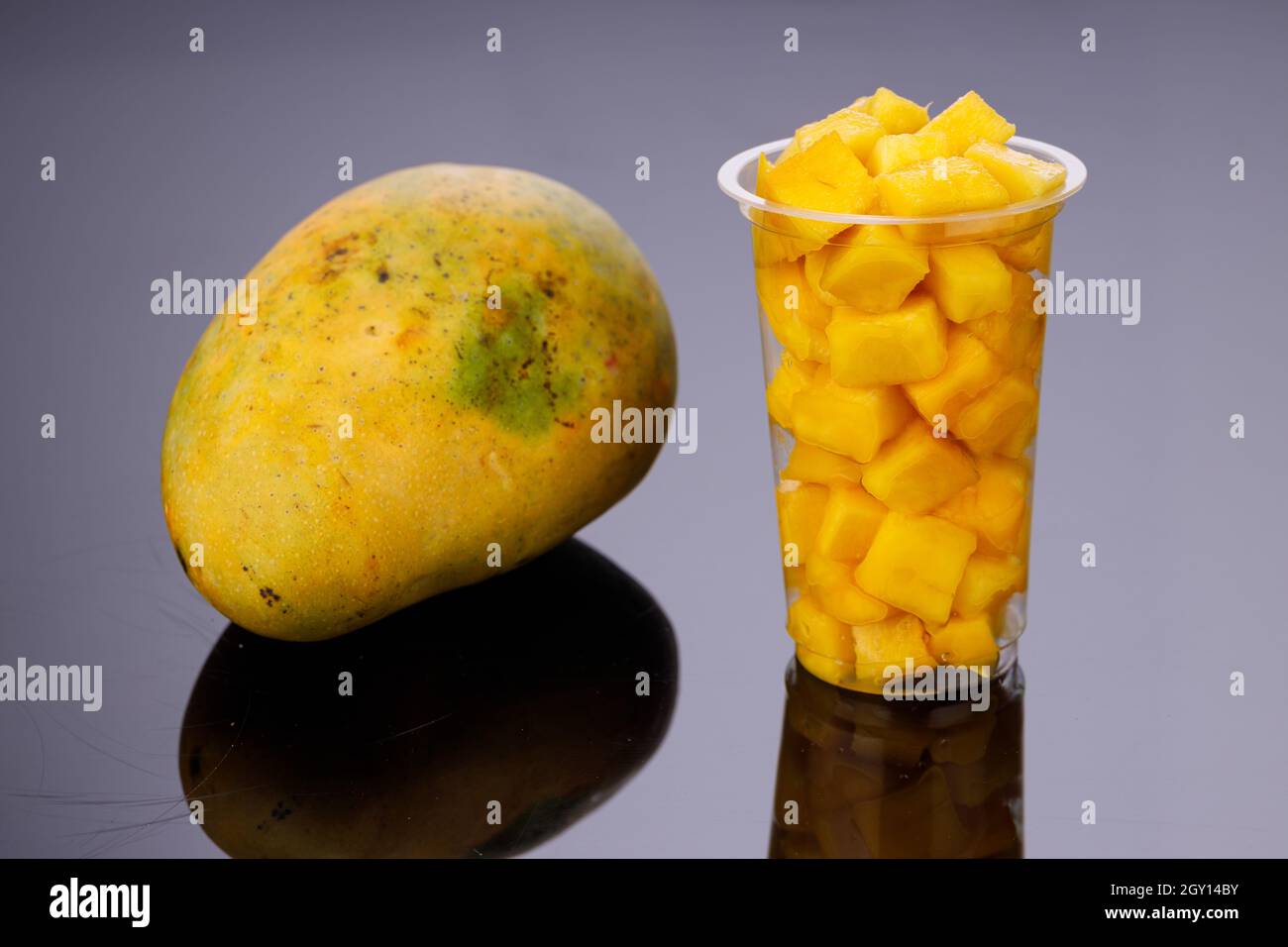 Juicy mango slices on hi-res stock photography and images - Alamy