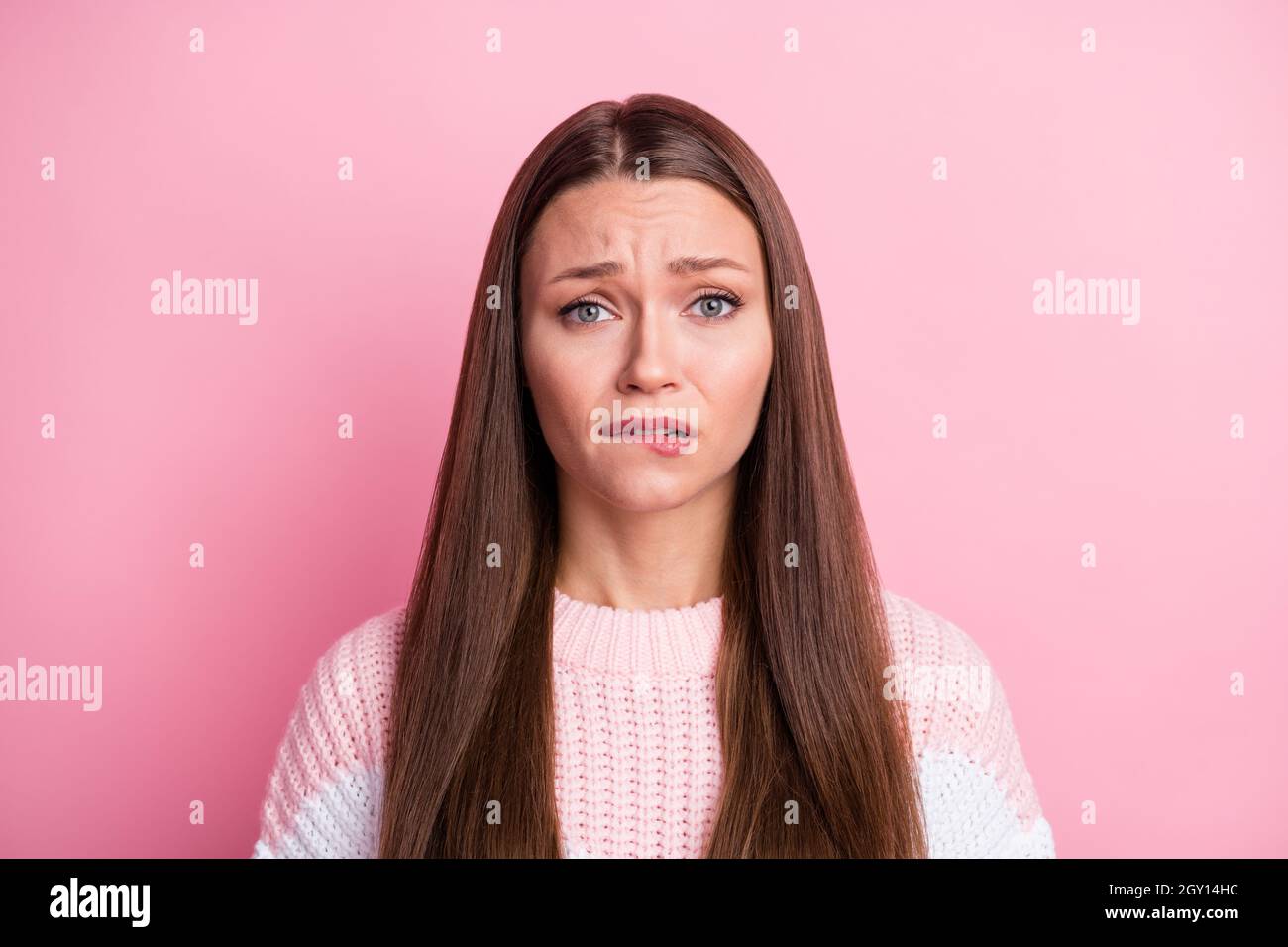 Photo portrait of guilty sad woman biting lip nervous unhappy isolated ...