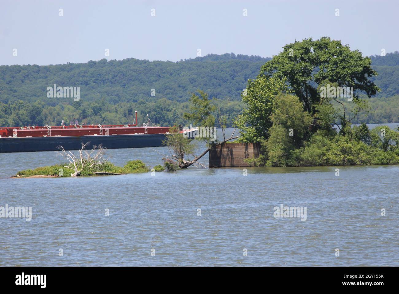 A large riverboat barge floats down on the river Stock Photo - Alamy