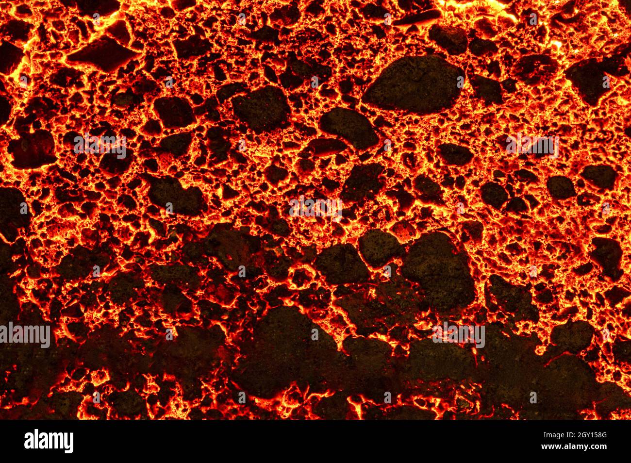 The surface of a hot liquid slag in a metallurgical ladle. Thick crust ...
