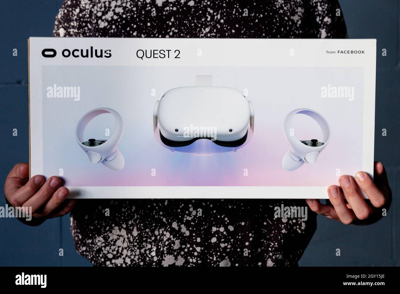 Child holds new VR head set box. A new generation gaming device for ...