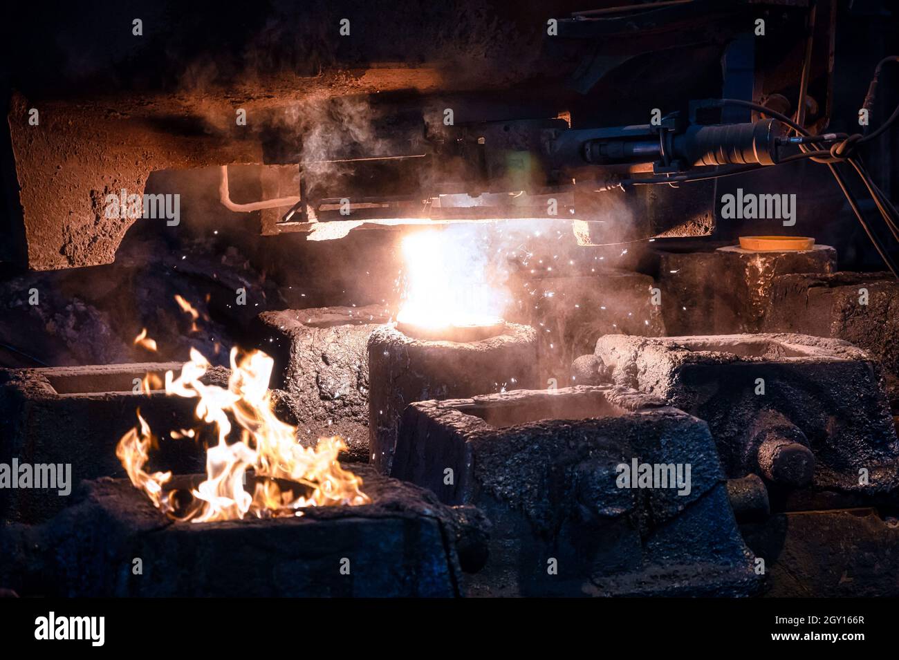 Glowing molten metal pouring from hi-res stock photography and images ...
