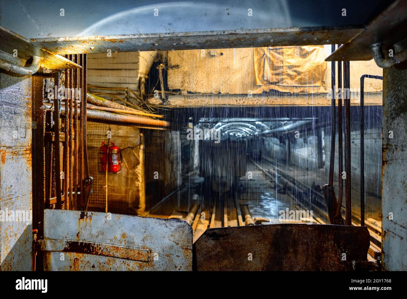 The view from the mine elevator, the mine tunnel is visible, a stream ...