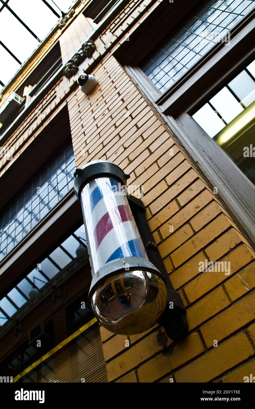 Barber shop candy stripe sign Stock Photo - Alamy