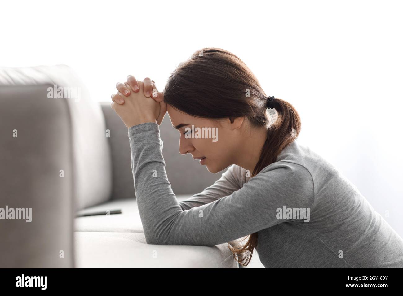 Sad despaired unhappy european young woman suffering from mental ...