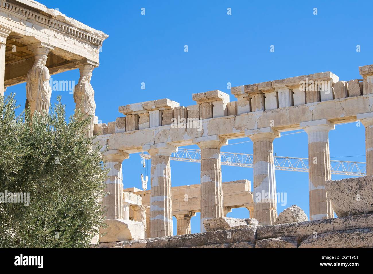 the Caryatids from the Erechtheion look at the Parthenon. Acropolis ...