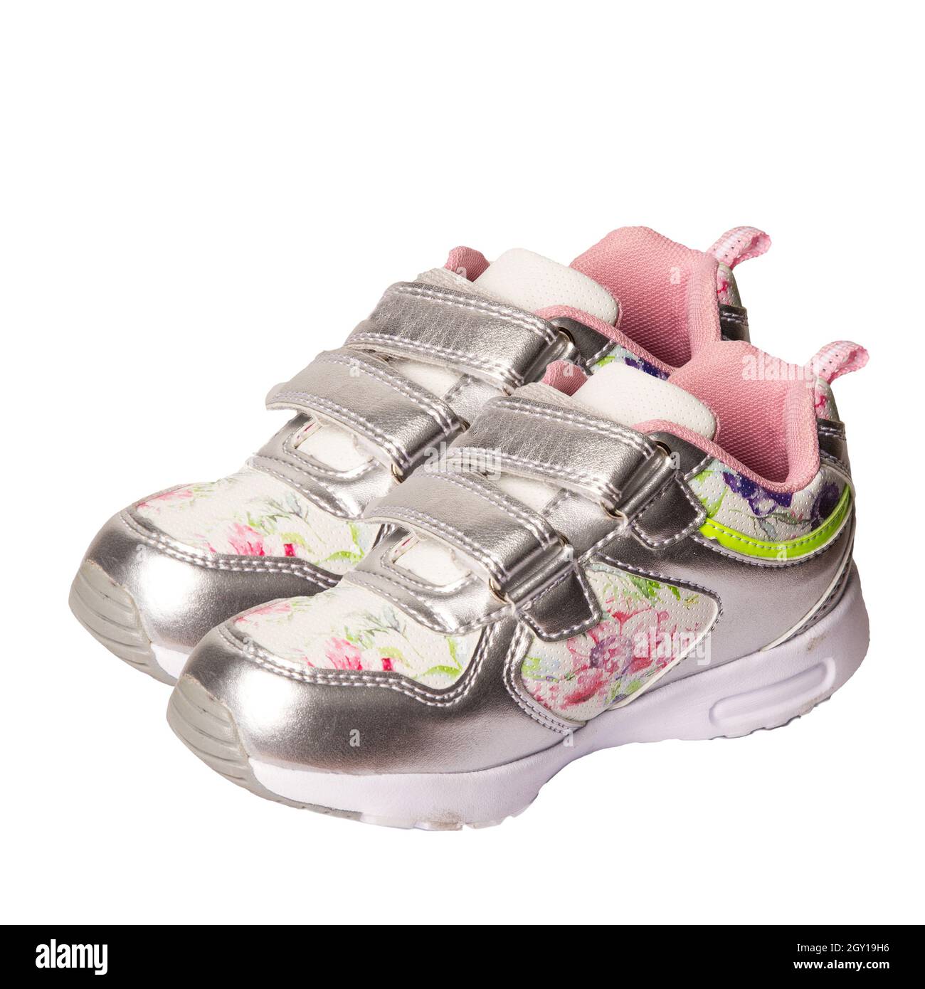 Children's sneakers in silver color Stock Photo - Alamy