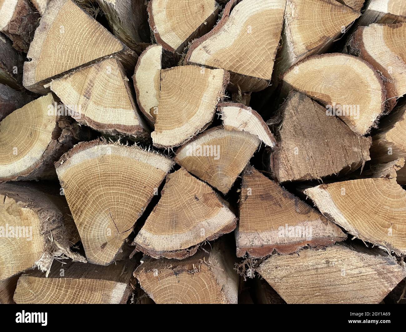 Closeup shot of dry chopped firewood logs in a pile Stock Photo - Alamy