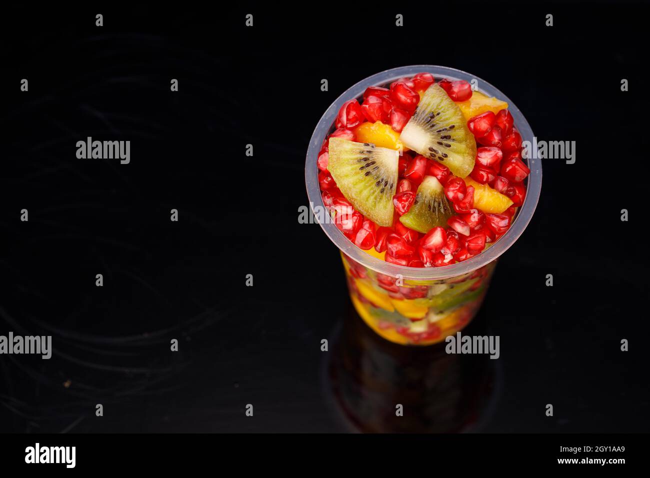 Mixed fruit cut pieces Stock Photo - Alamy