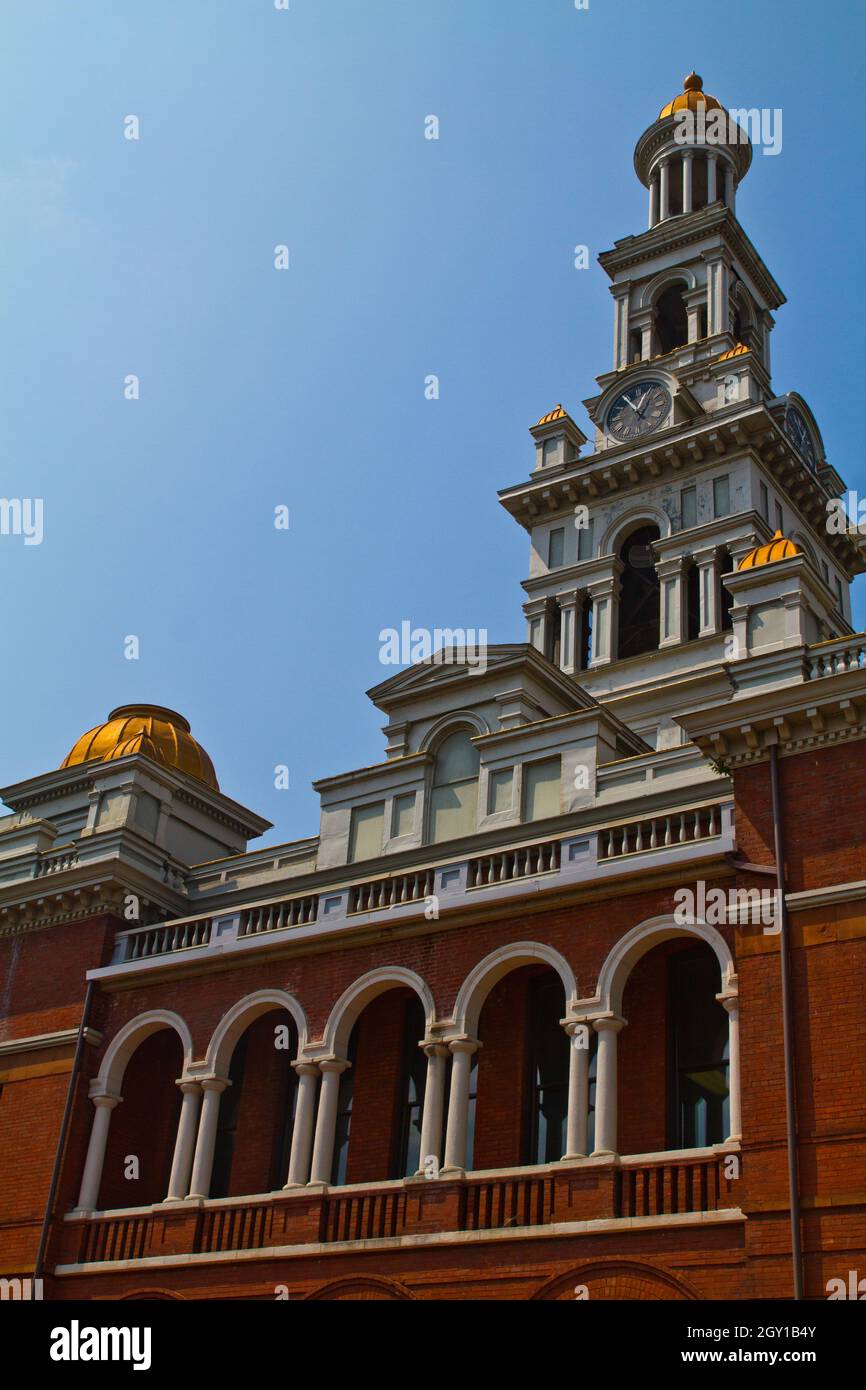 Greco-Roman architecture with white stone buildings and gold rotundas ...