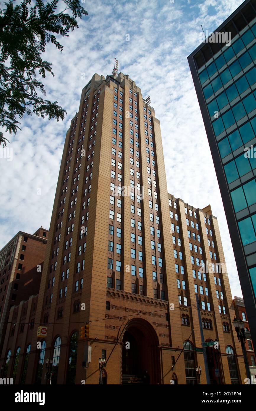 Tall Lansing skyscraper next to a glass-windowed building Stock Photo ...