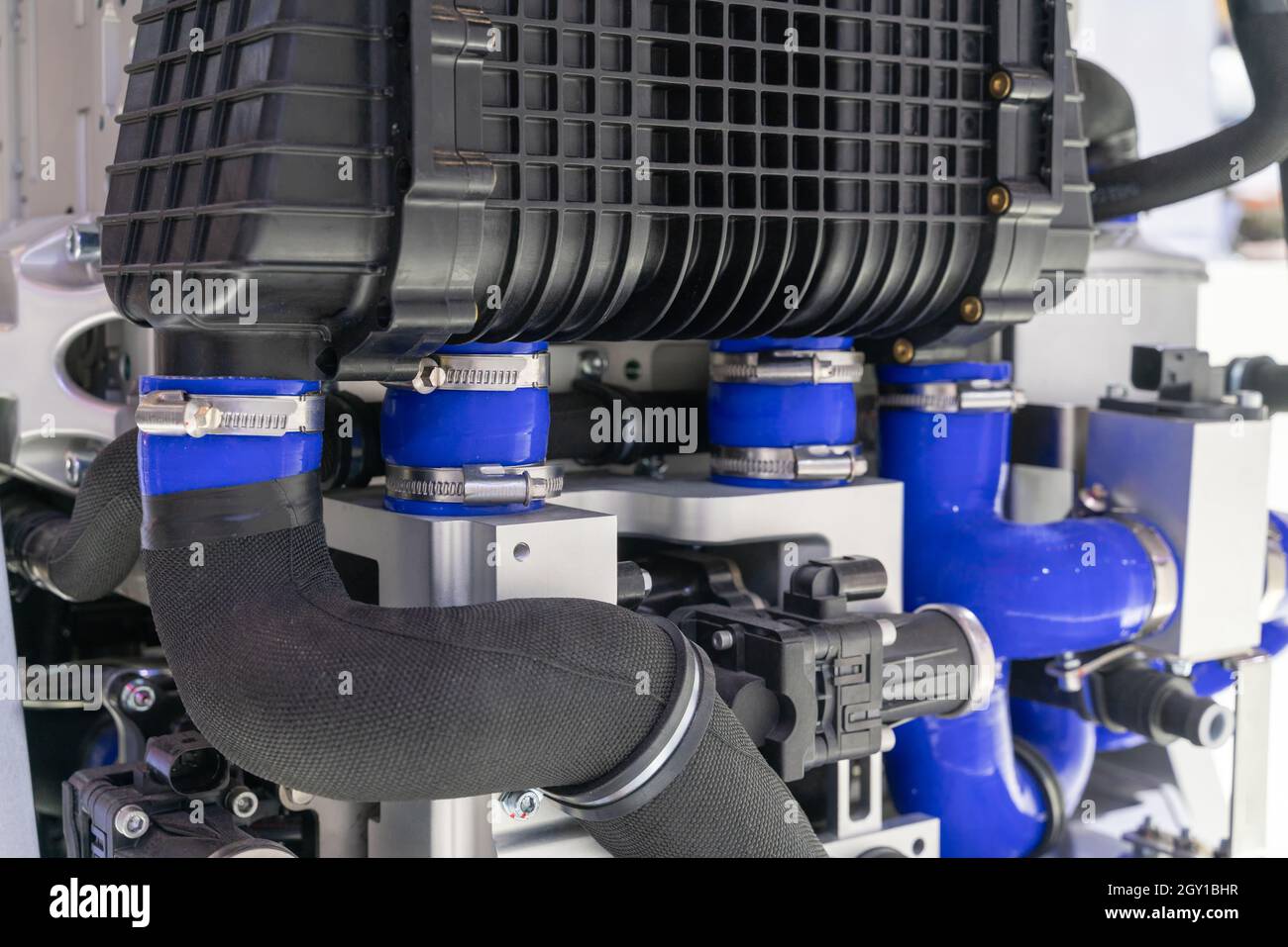 Closeup shot of a modern race car engine and spare parts Stock Photo ...