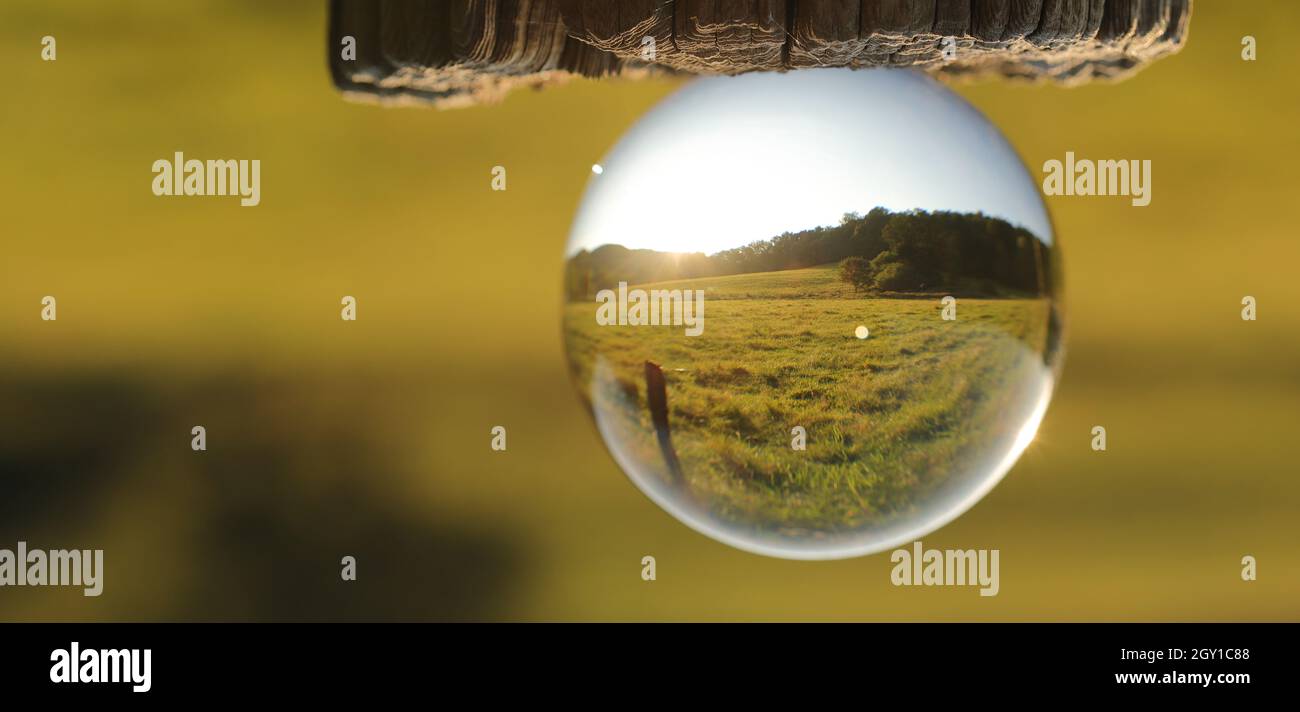 a beautiful landscape photographed through a lens ball Stock Photo - Alamy